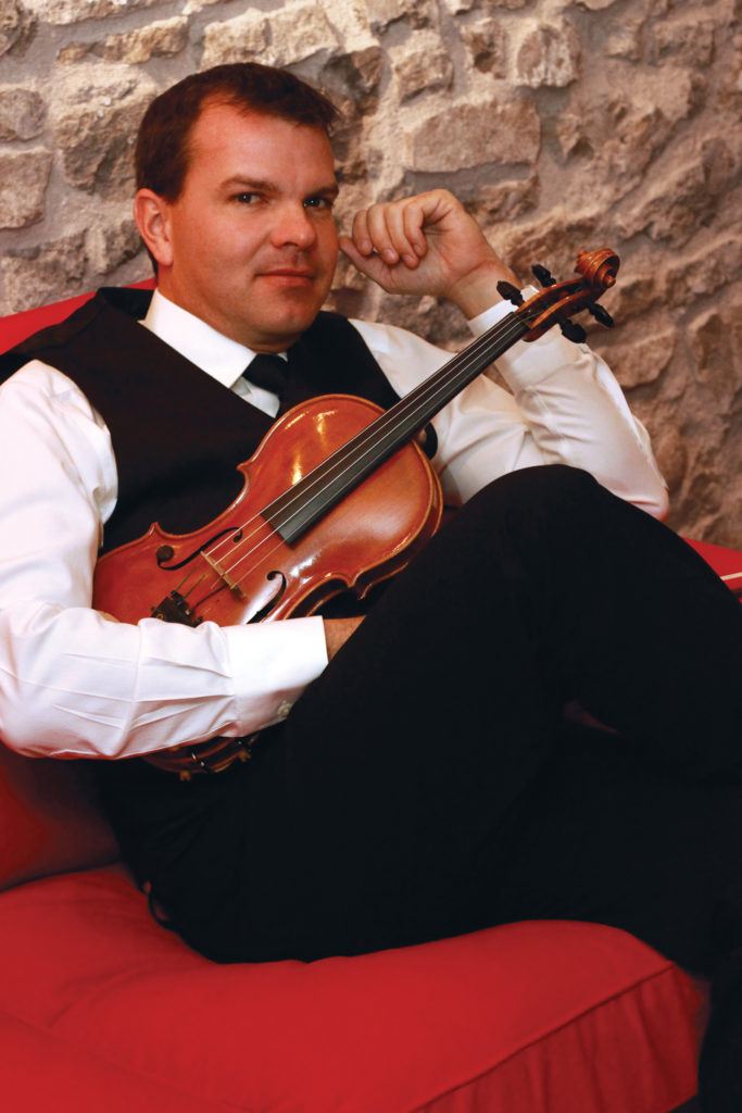 Fiddling champion set to stage Red Deer show - Red Deer Express
